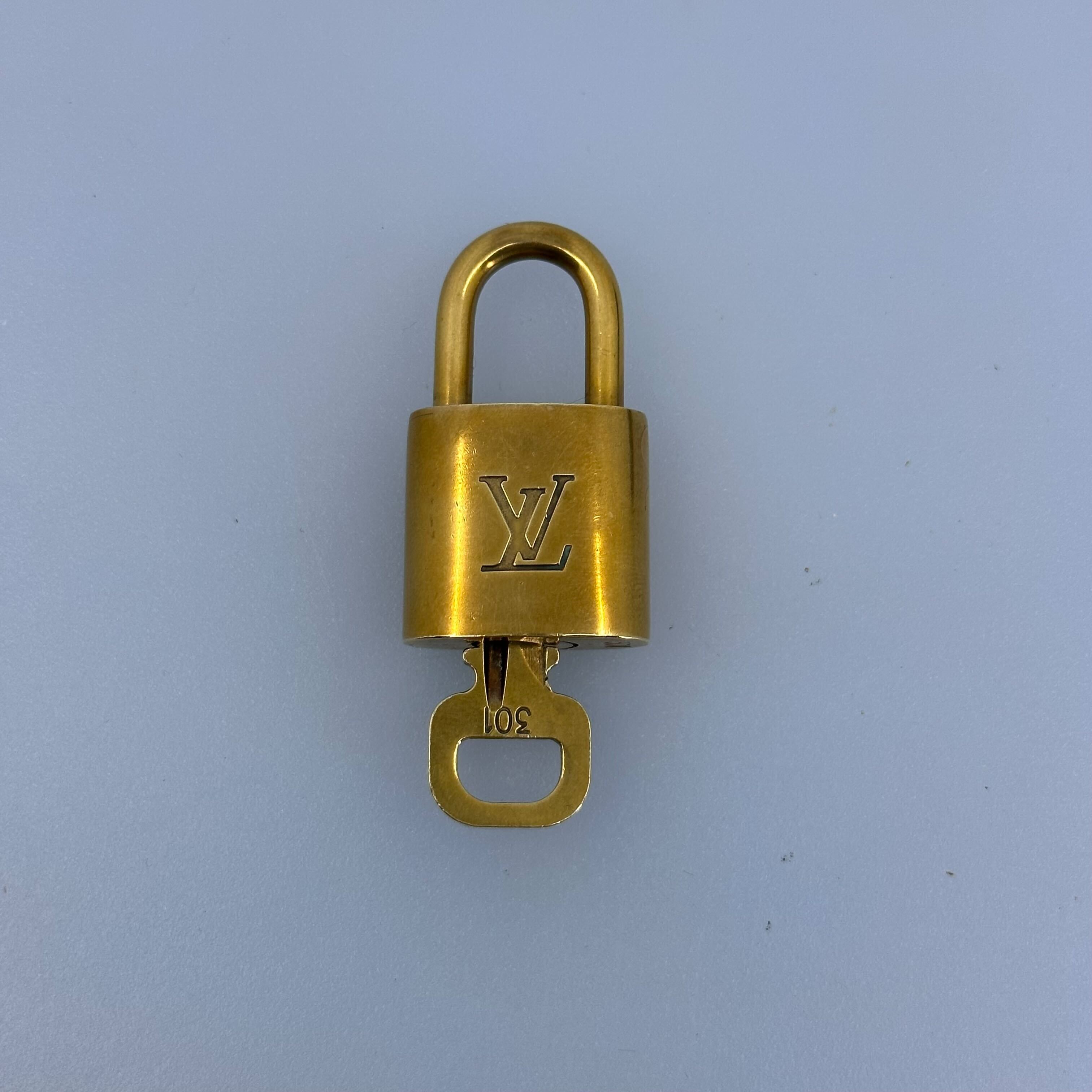 Louis Vuitton lás og lykill - Attikk